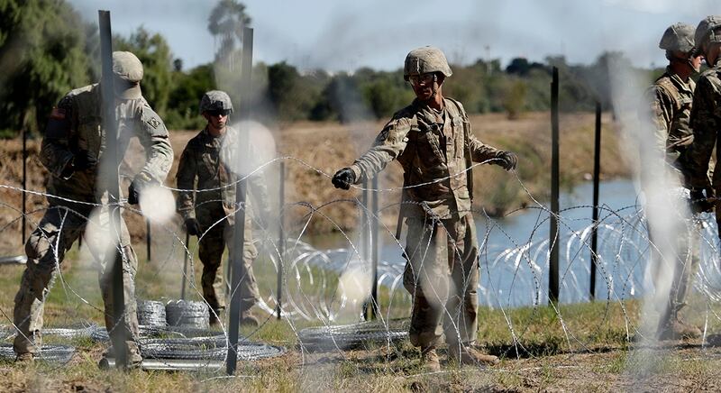 Razor wire is most visible result of $210M troop deployment to the US ...