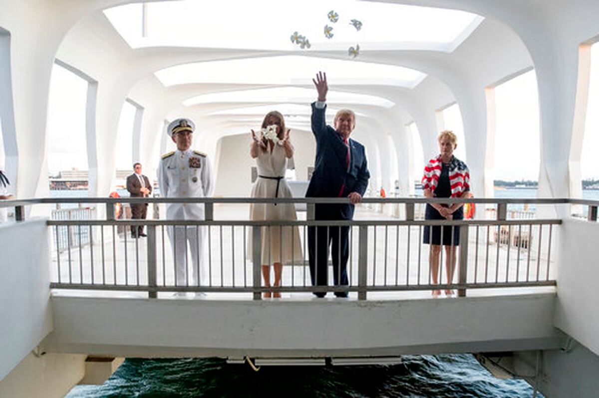 Trump pays solemn visit to USS Arizona memorial