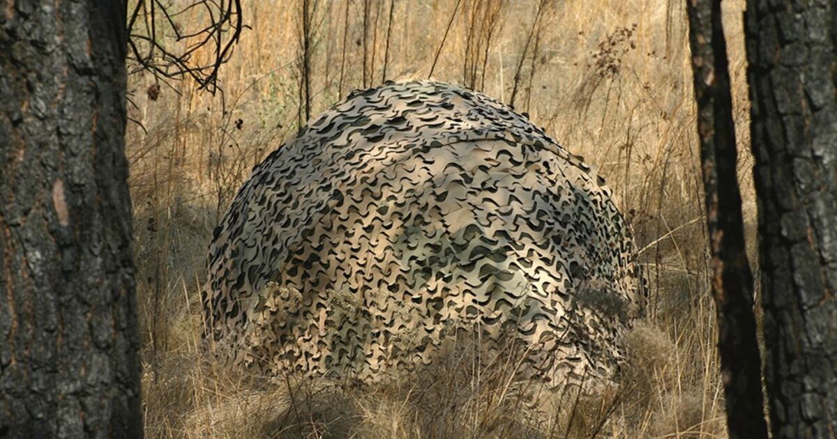 Can special camo netting hide Marines from eyes in the sky?