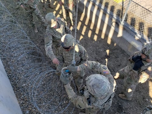 Razor wire is most visible result of $210M troop deployment to the US ...