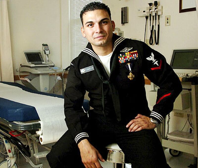Navy corpsman ran through a wall of fire to save his Marines during ...
