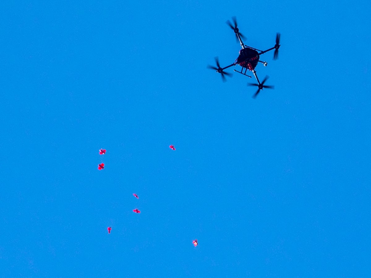 Watch a mothership drone release its swarm