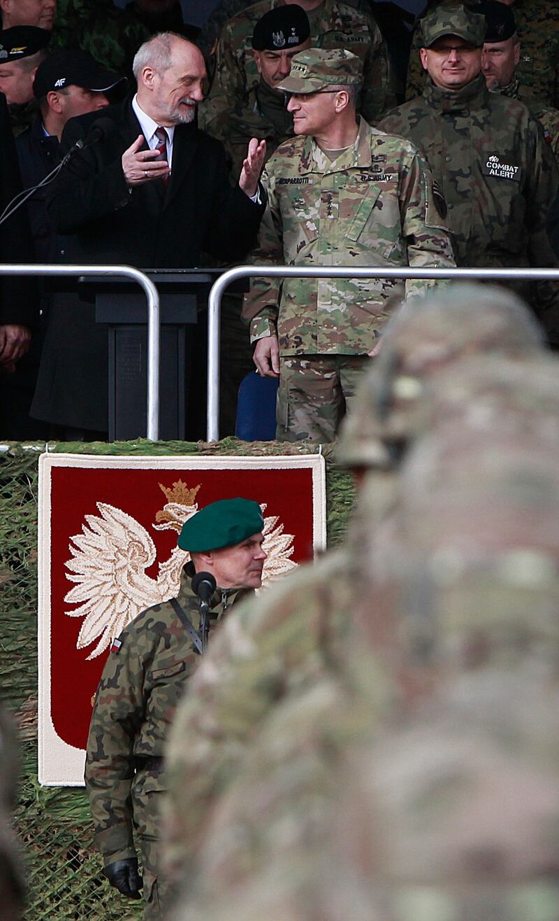 Polish leader welcomes NATO troops, hails 'historic moment'