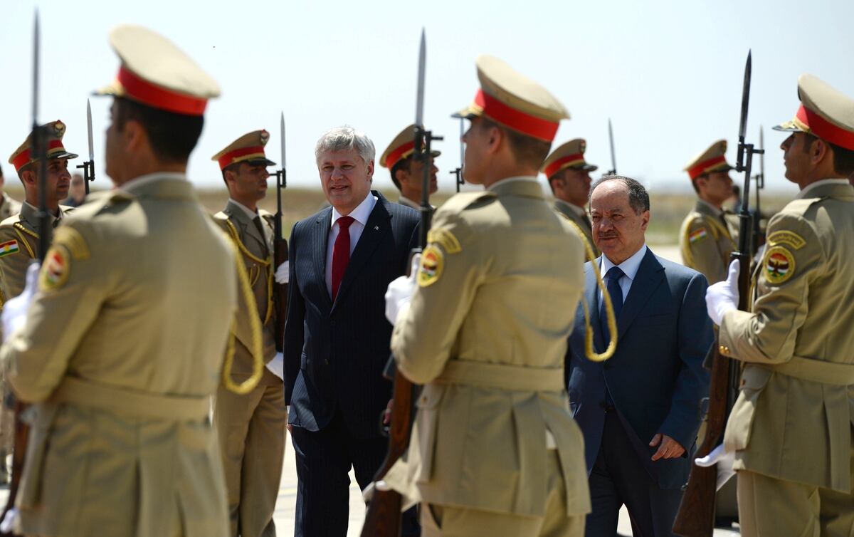 Canadian prime minister visits Iraq as bomb attacks kill 13