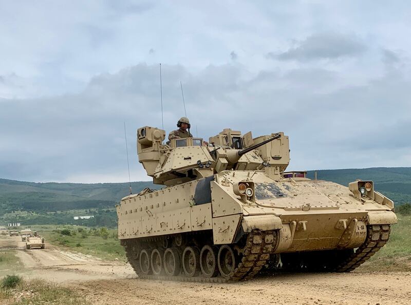 These soldiers ran a robot combat vehicle in rifle platoon maneuvers