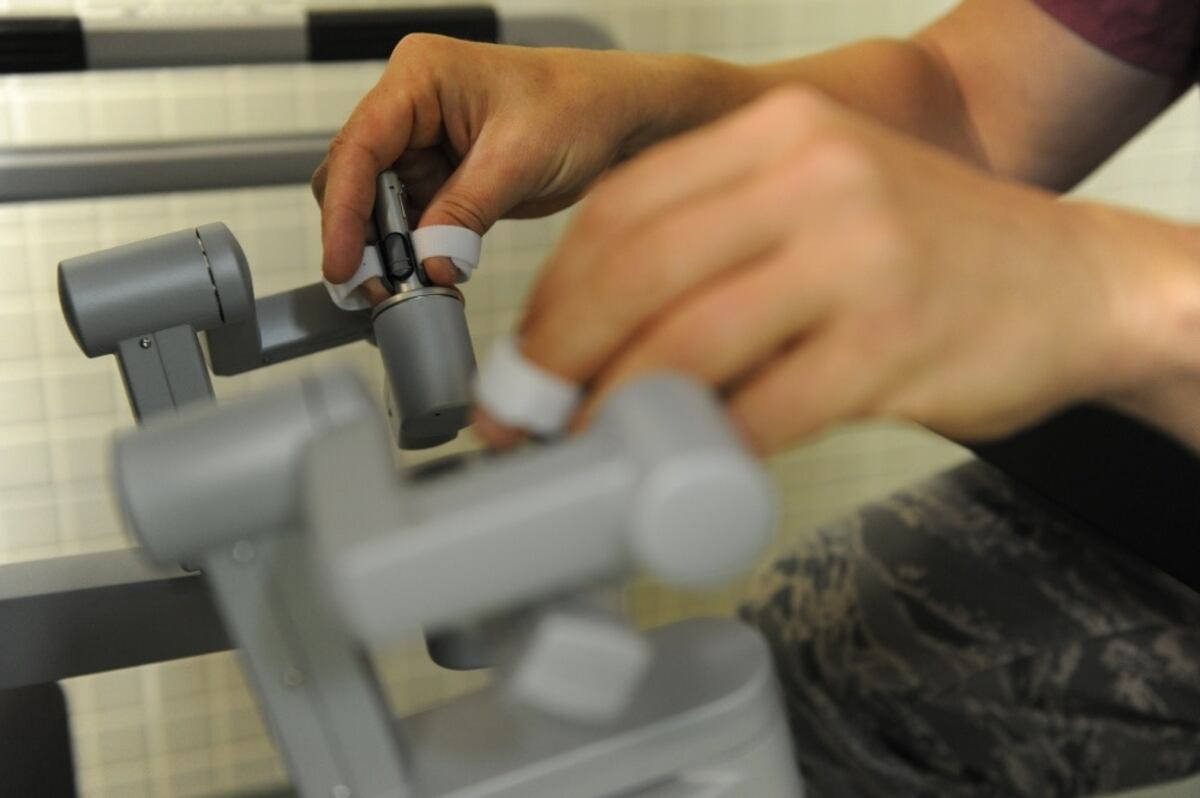 Doctors perform the Air Force's first robotic surgery