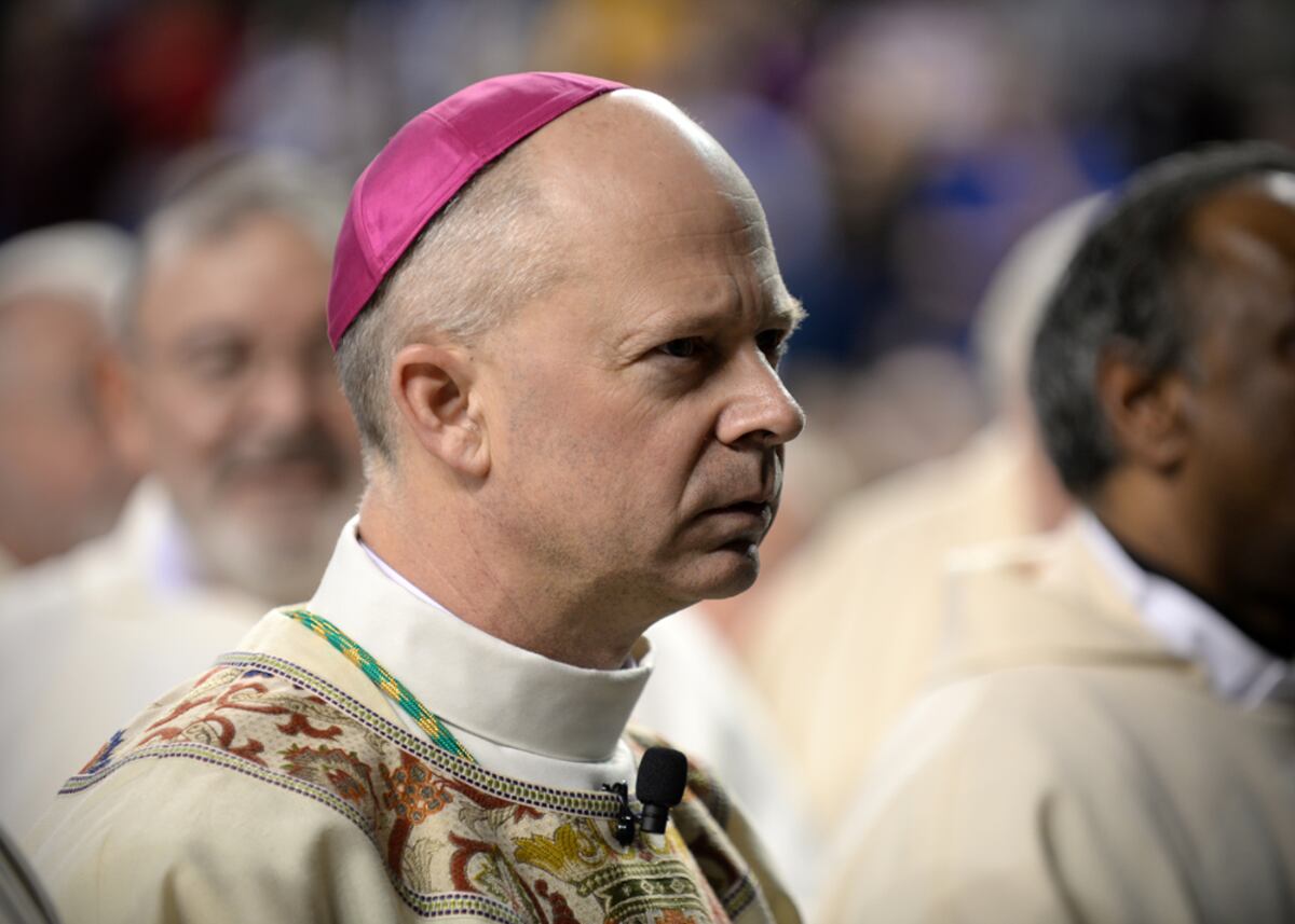 Military chaplain installed as Catholic bishop