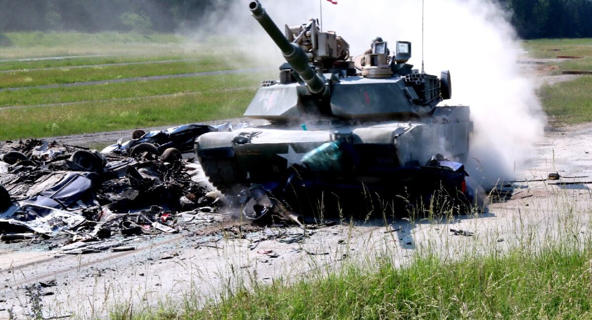 Tankers smash up piles of cars in Strong Europe Tank Challenge