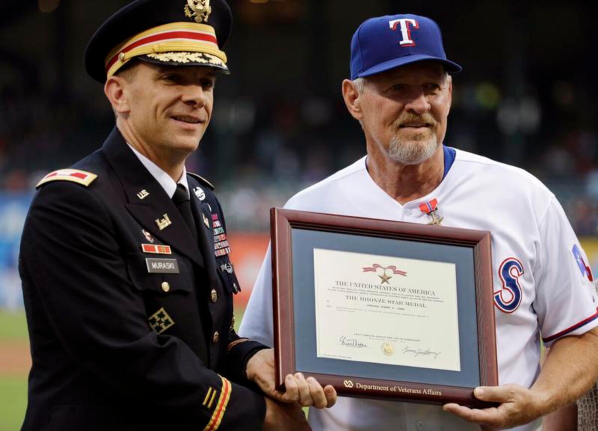 Texas Rangers coach Bobby Jones presented with Bronze Star at game