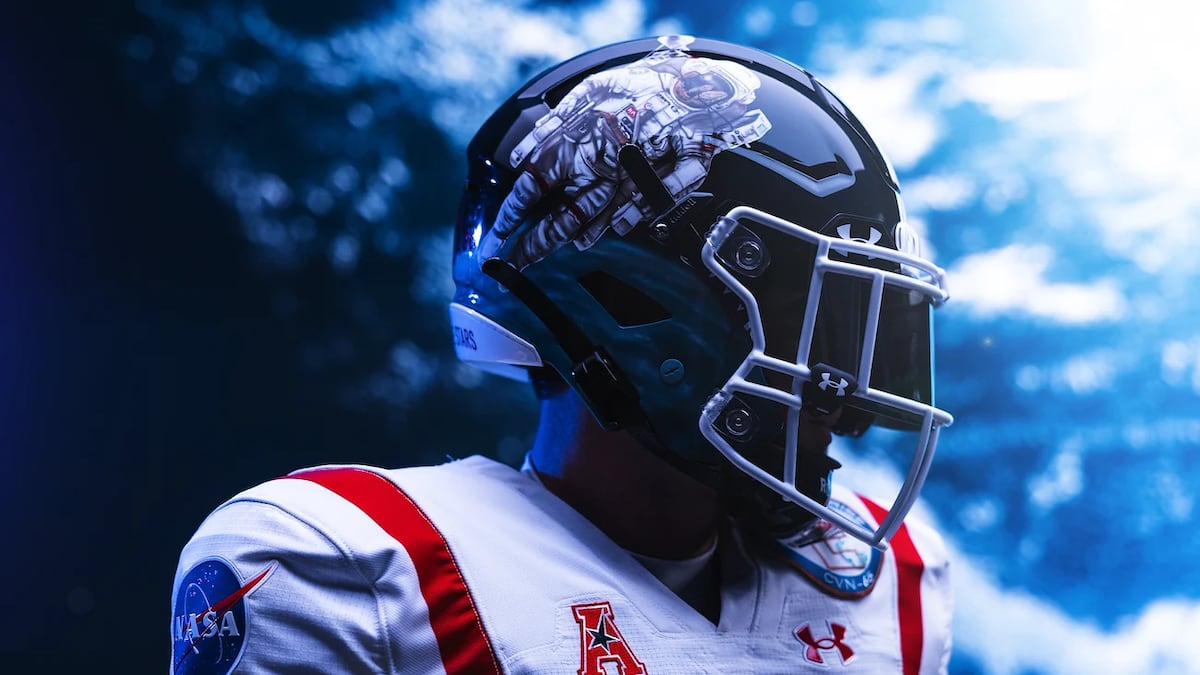 That’s not just any astronaut on Navy’s helmet, that’s Navy royalty