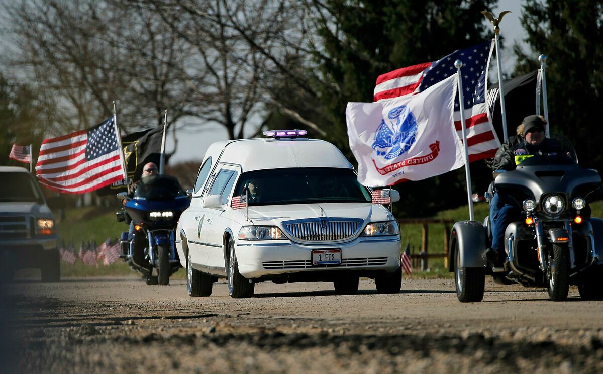 Fallen soldier honored at his hometown funeral