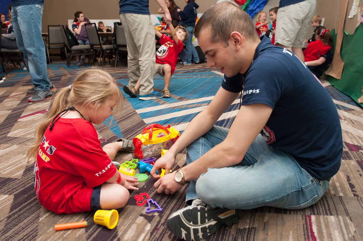 Mentors help children of the fallen cope with loss