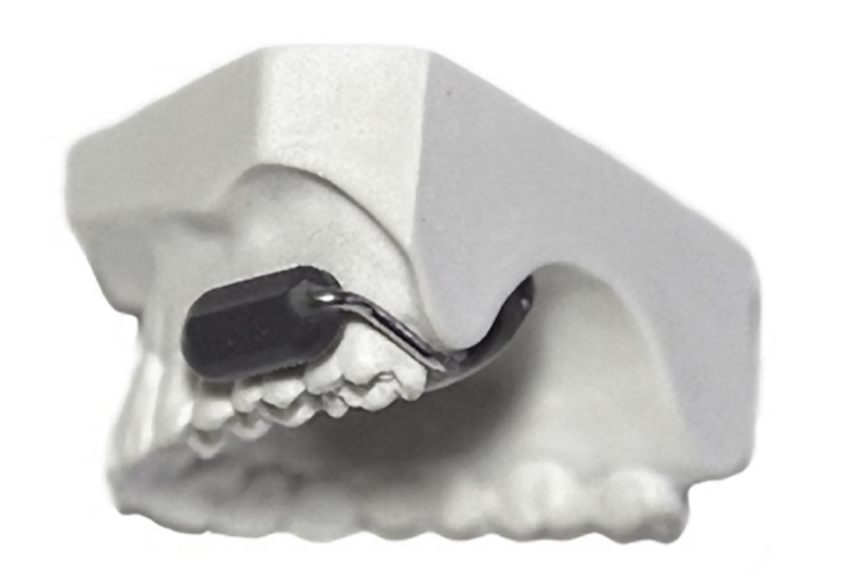 This new wireless communication device fits on your teeth