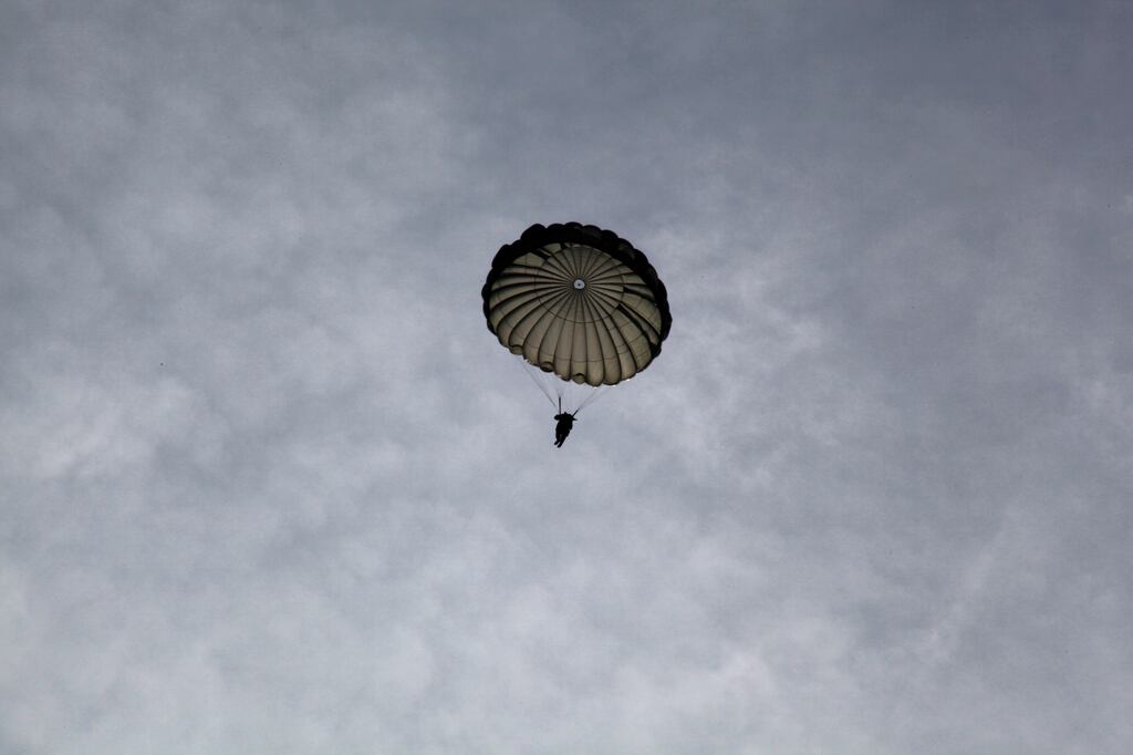 Soldier rescued after parachute caught in power lines