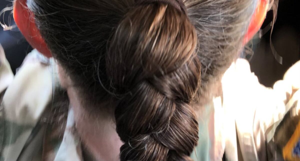 Female soldiers celebrate the Army’s new ponytail, braid policy