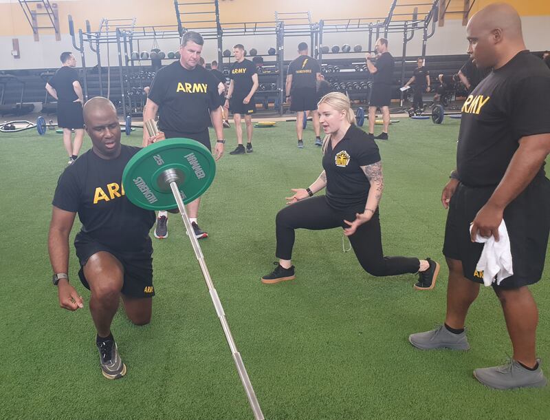 Army says fitness plan cut injuries and drug use, aids mental health