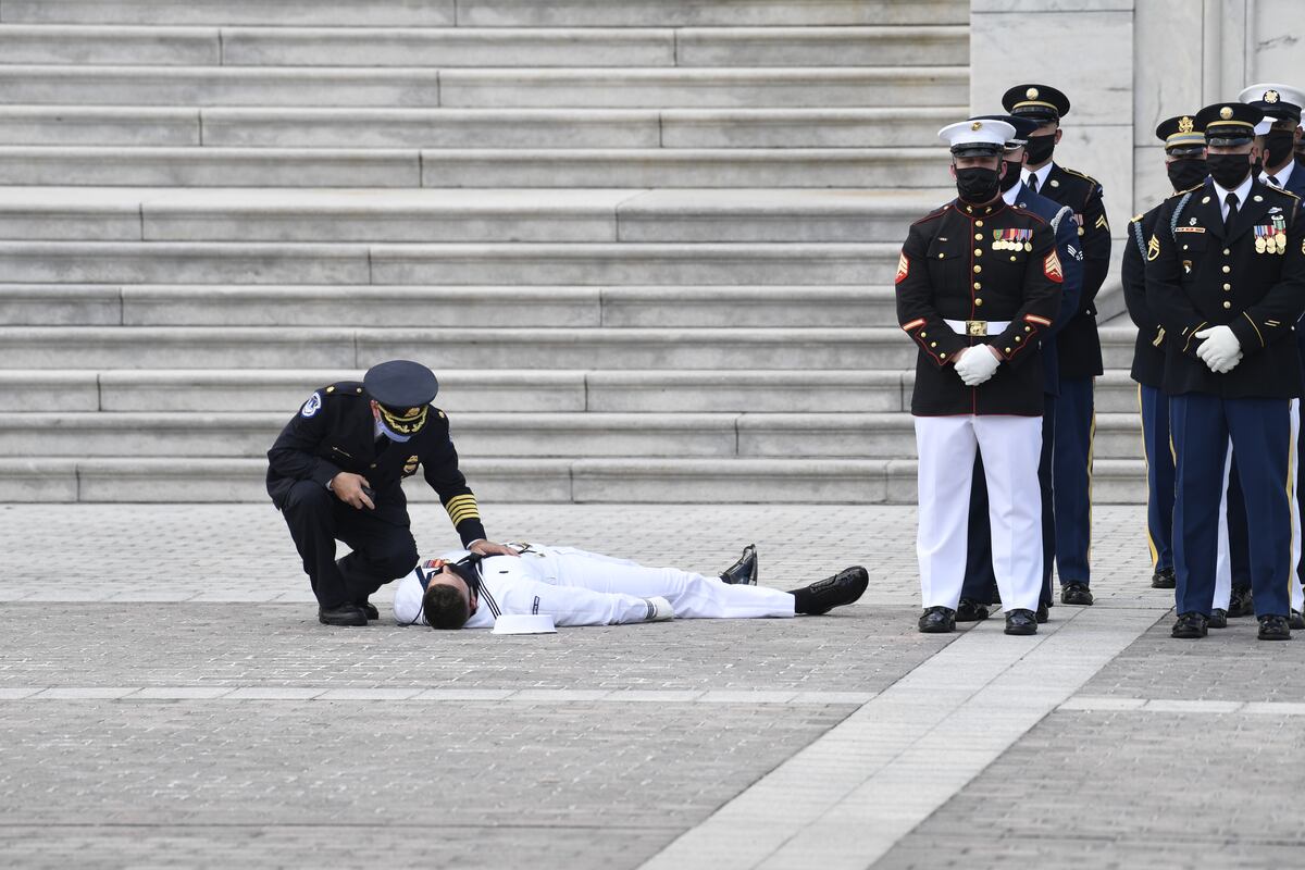 Honor Guard sailor collapses from ‘extreme heat and dehydration’ during ...