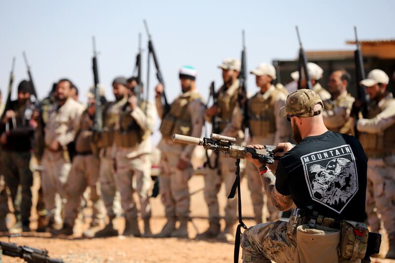 US sends mechanized troops back into Syria