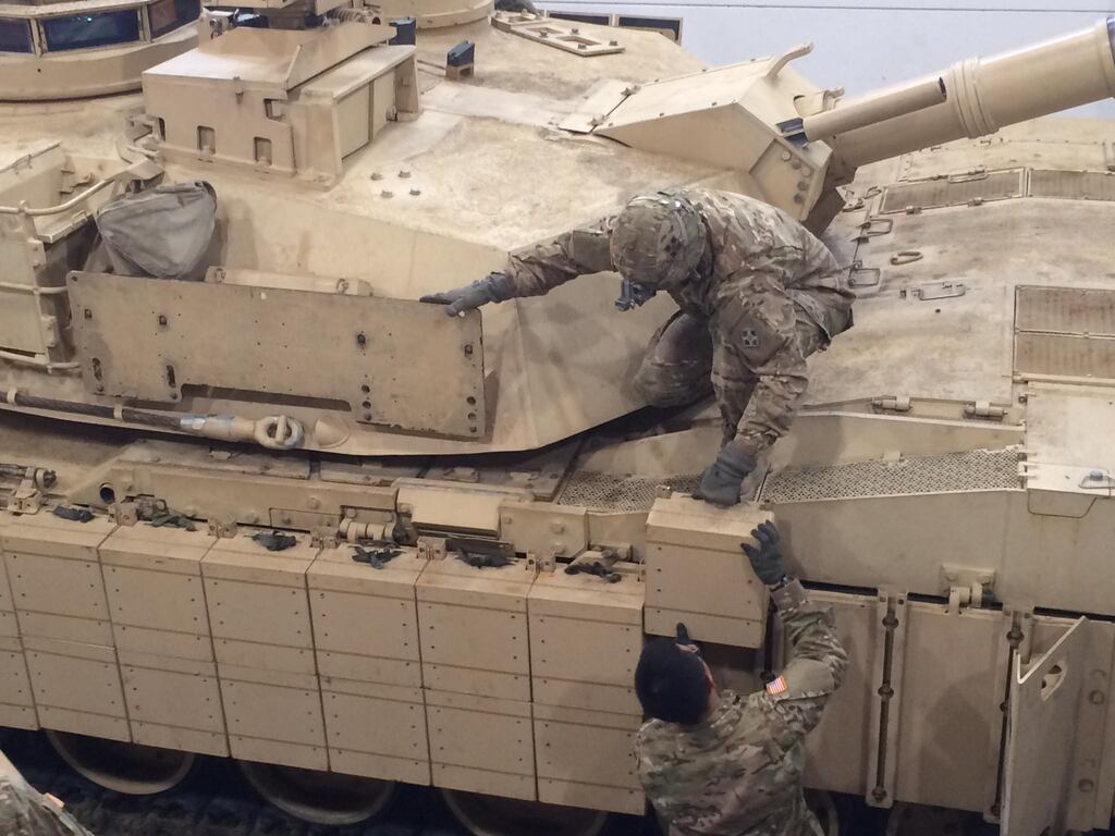 Reactive armor deflects blasts away from tank crews