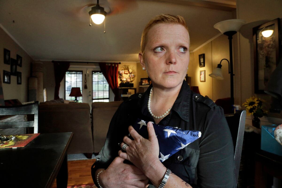 Wife of female soldier killed in Afghanistan to receive death benefits