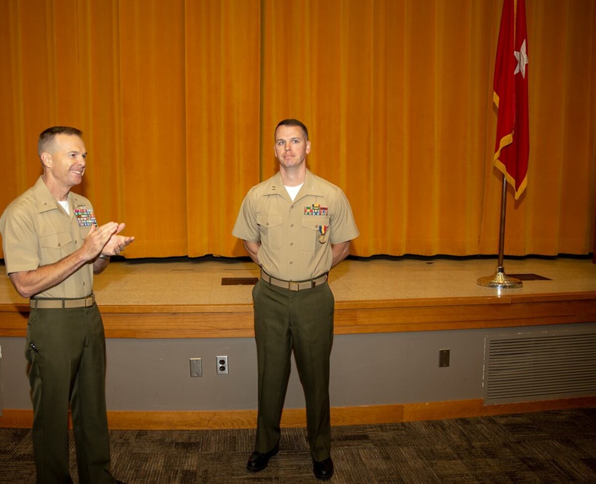 Marine intelligence officer awarded medal for rescuing unconscious man ...