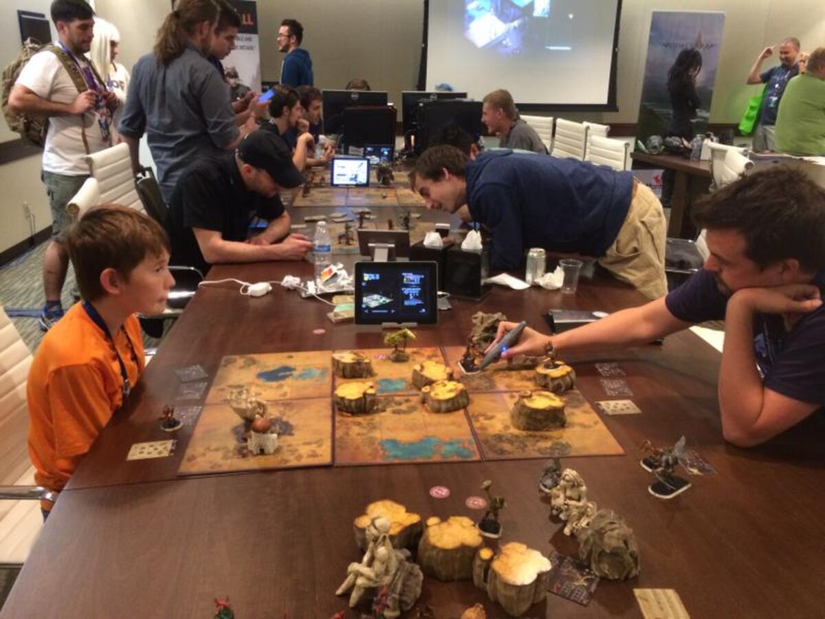 'Golem Arcana': Tabletop tactics meet massively multiplayer action