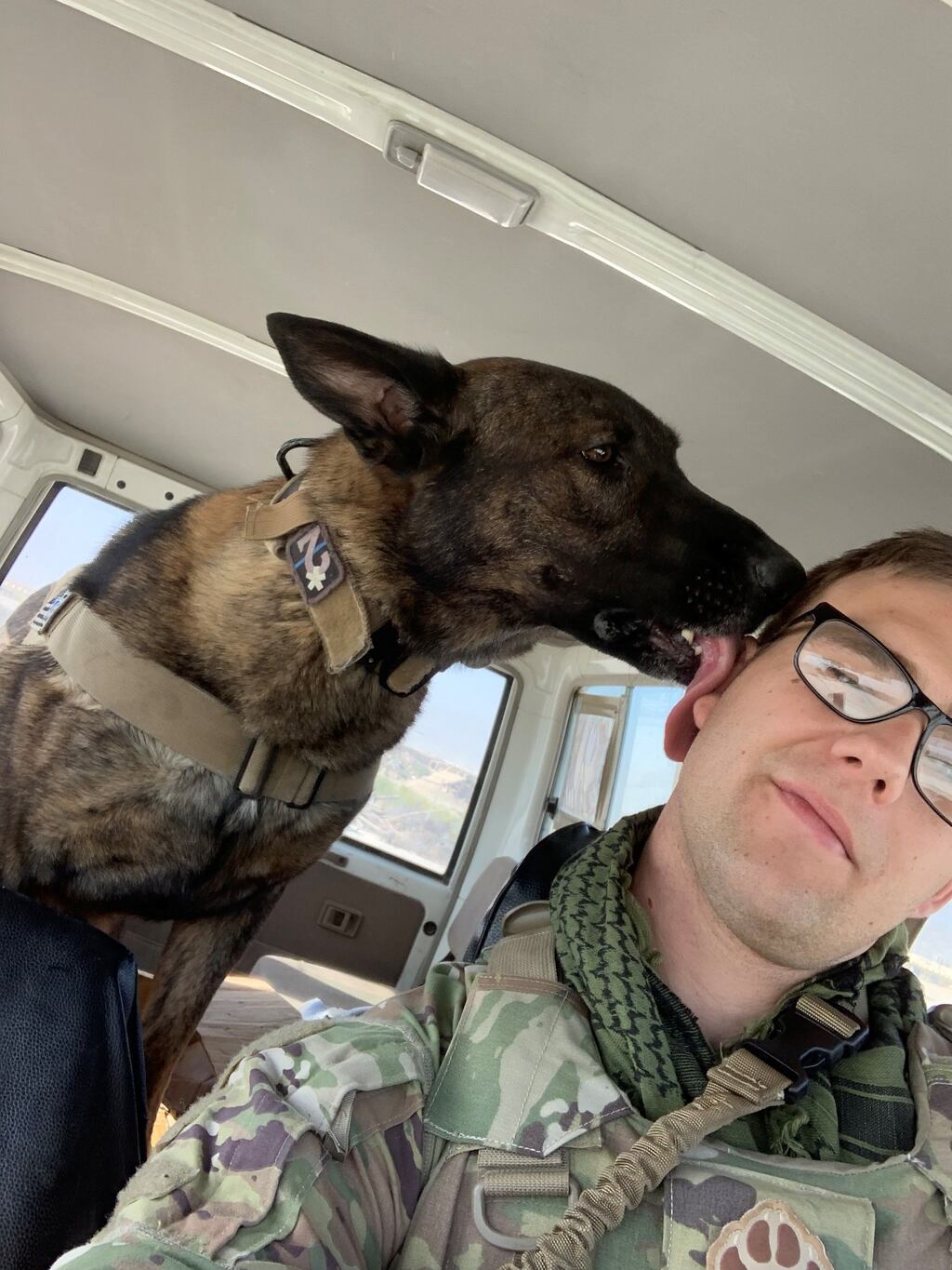 Army dog handler reunites with bomb-sniffing buddy after years apart